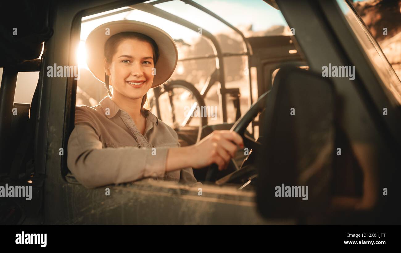 Desert Road Trip: Portrait of Beautiful Female Explorer Looking out of ...
