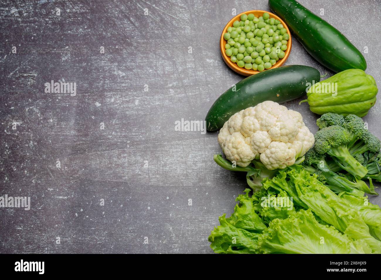 creative layout of healthy vegetables composed of lettuce, cucumbers ...