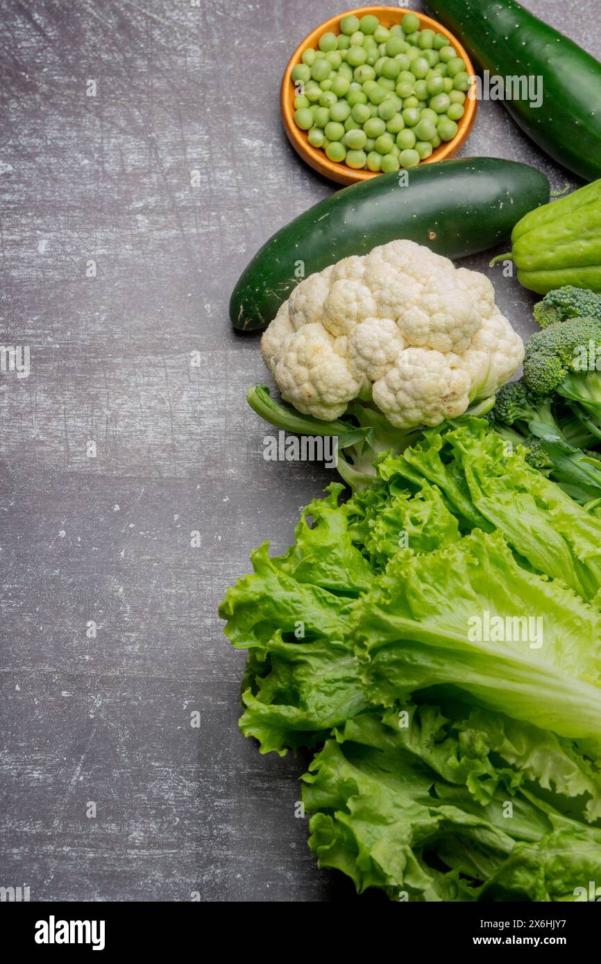 creative layout of healthy vegetables composed of lettuce, cucumbers ...