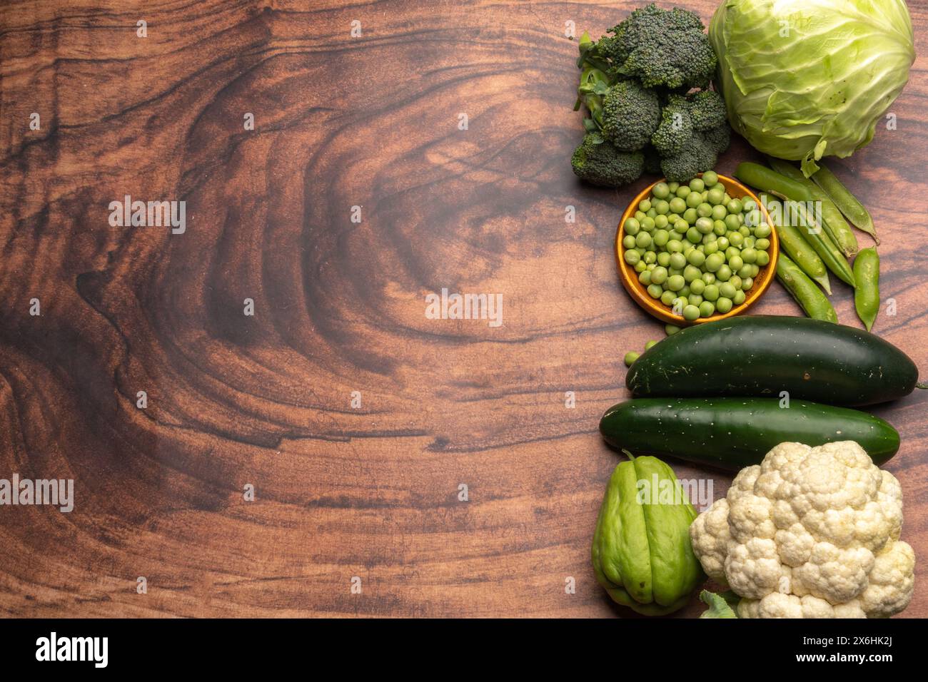 creative layout of healthy vegetables composed of lettuce, cucumbers ...