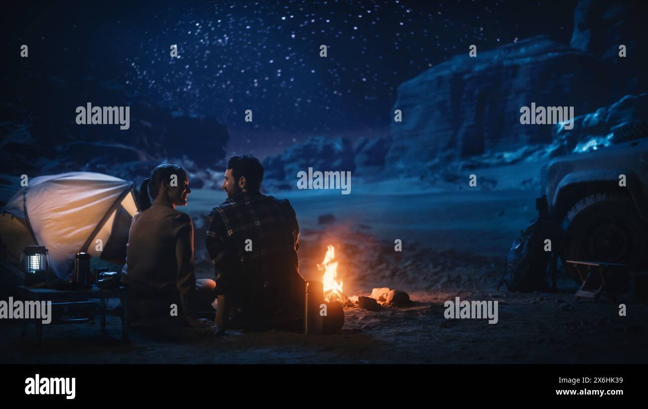 Happy Couple Nature Camping in the Canyon, Sitting Watching Campfire ...