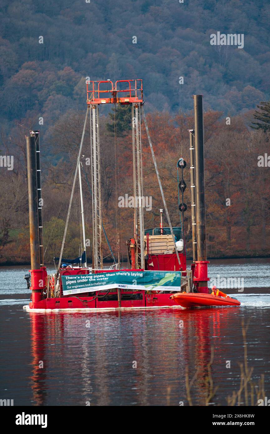 Untreated sewage pumped into Lake Windermere .Laying of pipe work to ...