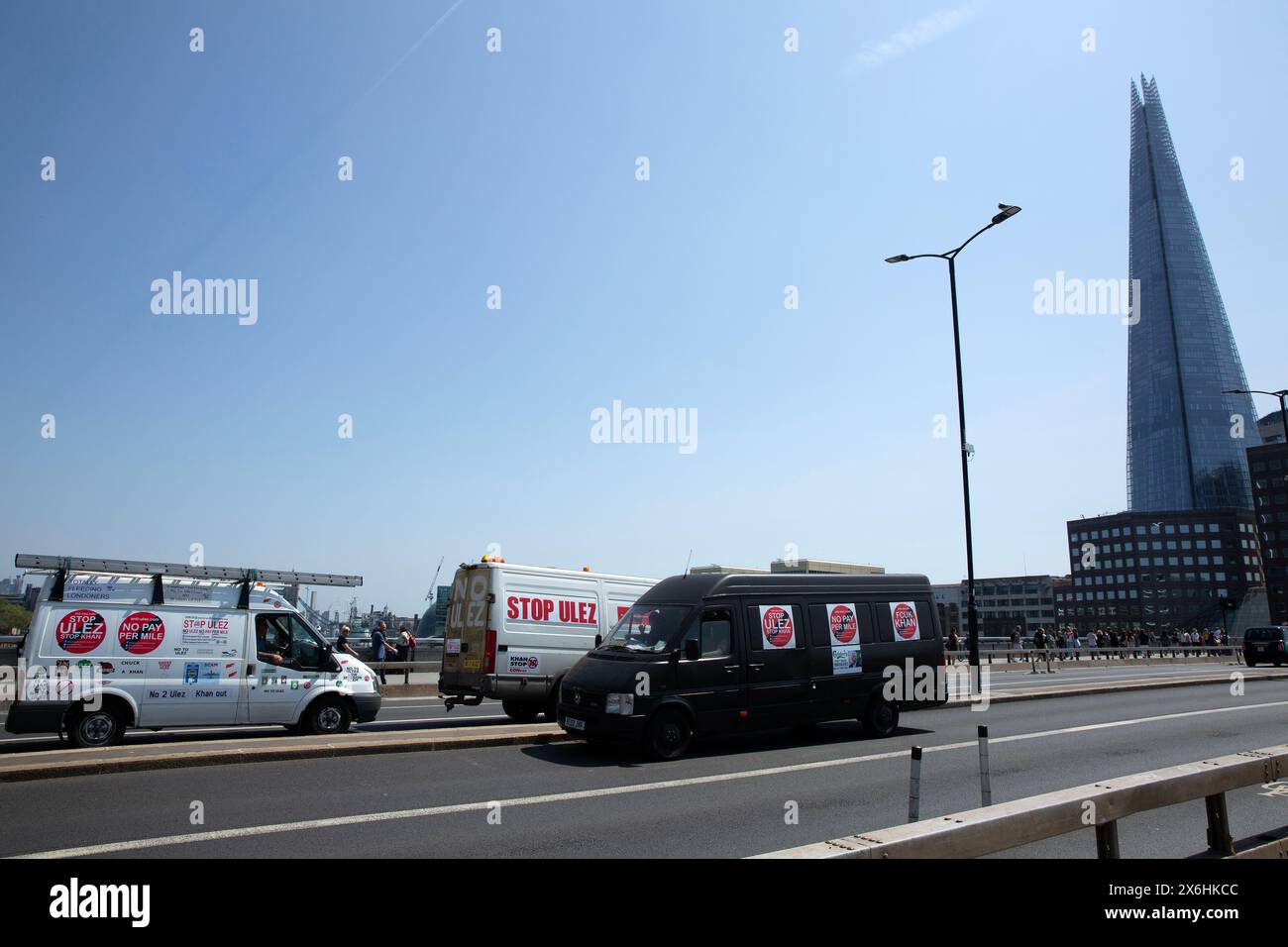 Vans with stickers are seen as participants gather for an anti-ULEZ ...