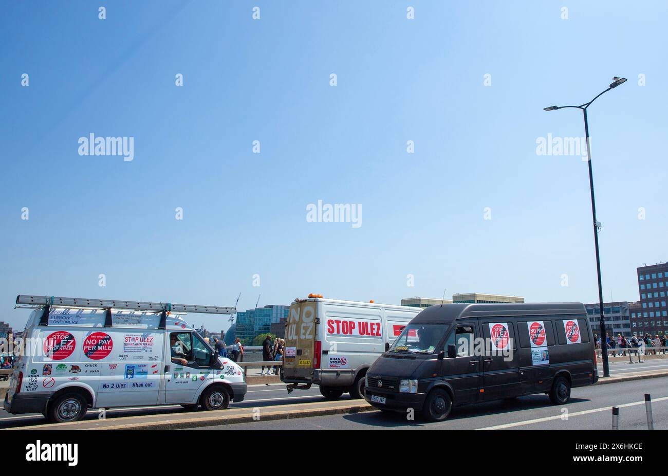 Vans with stickers are seen as participants gather for an anti-ULEZ ...