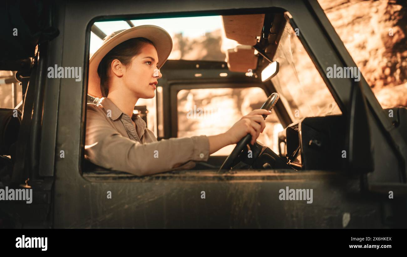 Desert Road Trip: Portrait of Beautiful Female Explorer Looking out of ...