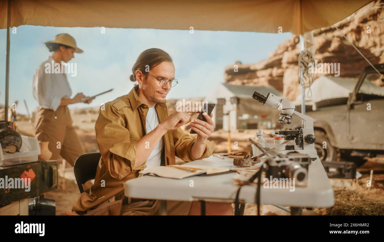 Archaeological Digging Site: Great Male Archaeologist Doing Research ...