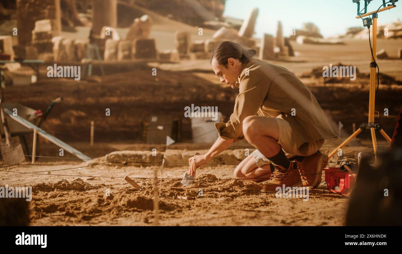 Archaeological Digging Site: Great Male Archeologist Work on Excavation ...