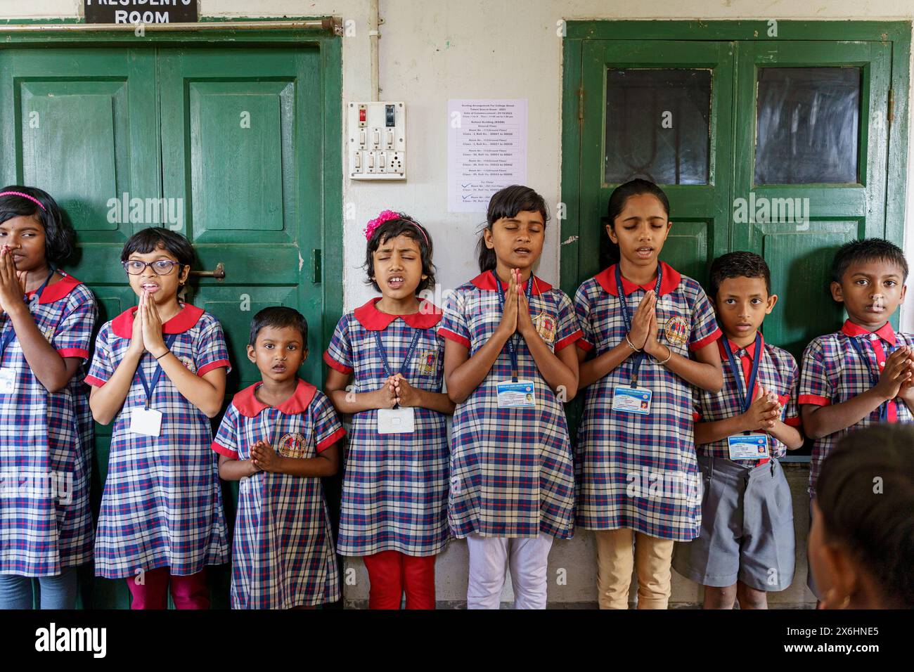 Kolkata, India - 20 October 2024: children in uniform praying and ...