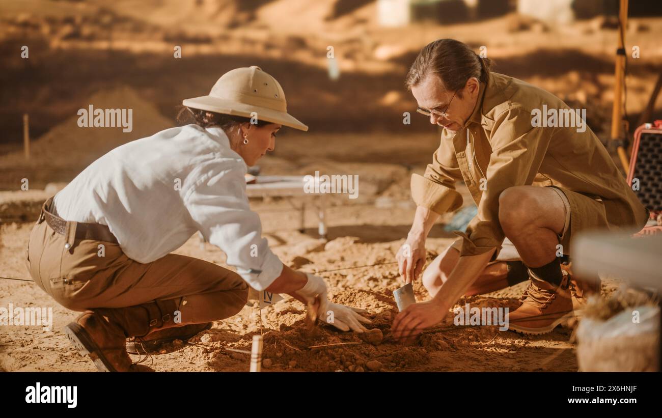 Archaeological Digging Site: Two Great Archeologists Work on Excavation ...