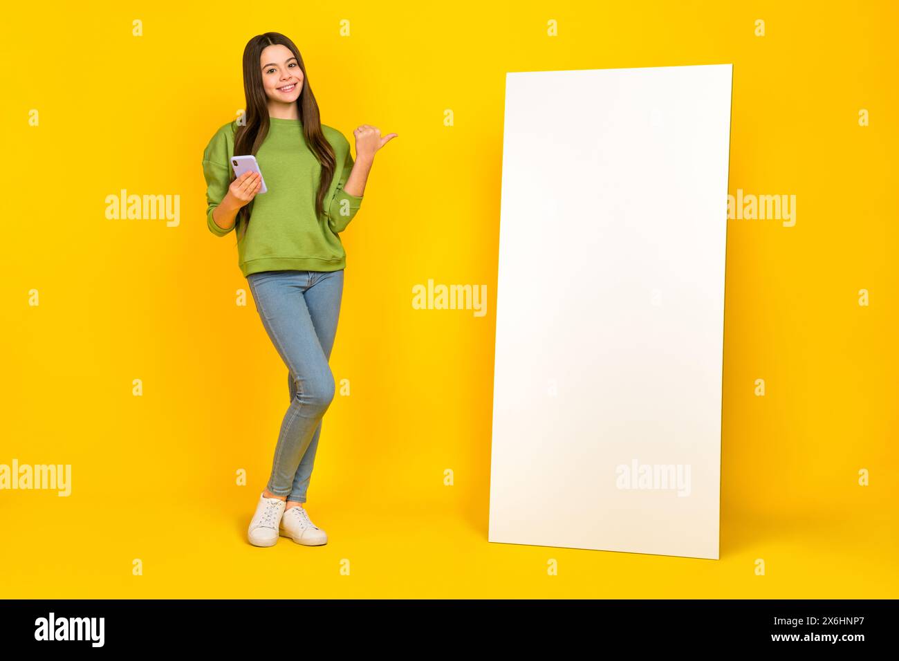 Full body photo of young girl indicate finger banner select recommend ...