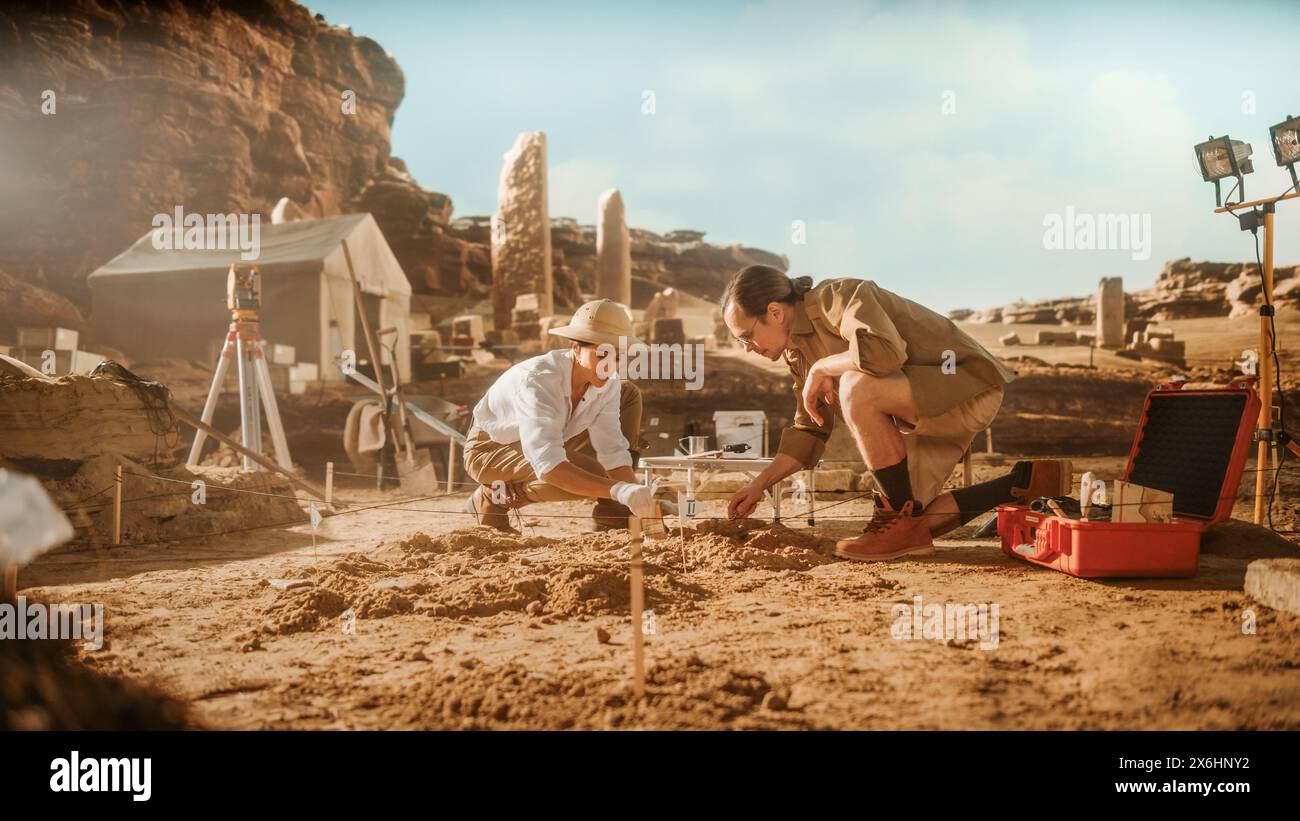Archeological Digging Site: Two Great Archeologists Work on Excavation ...