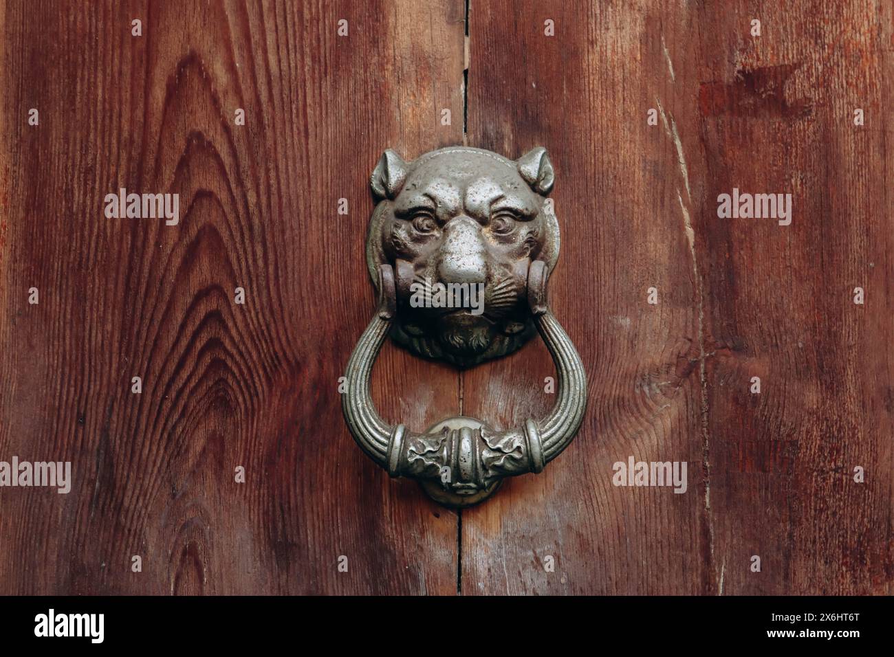 Beautiful door handle on an antique wooden door in Rome Stock Photo - Alamy