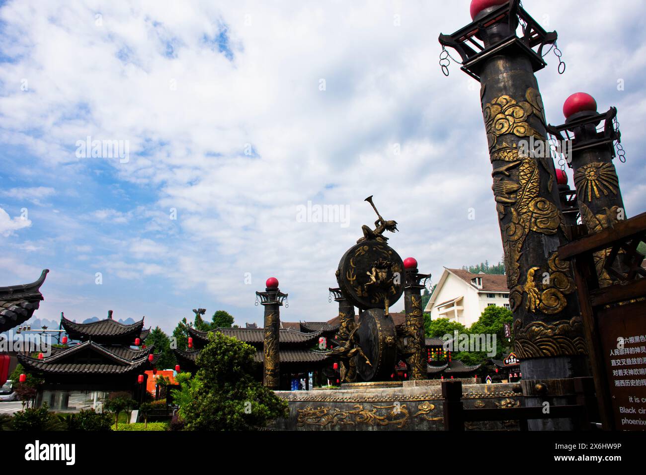 Totem Pole and chinese actress women people playing hit klong or big ...