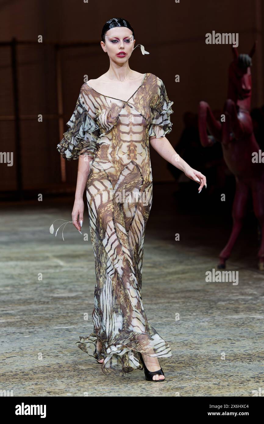 Sydney, Australia. 15th May, 2024. A model walks the runway during the ...