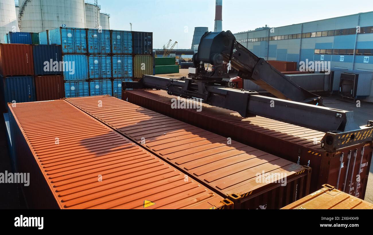 Aerial Shot of a Container Handler Carrying a Large Red Shipping Cargo ...