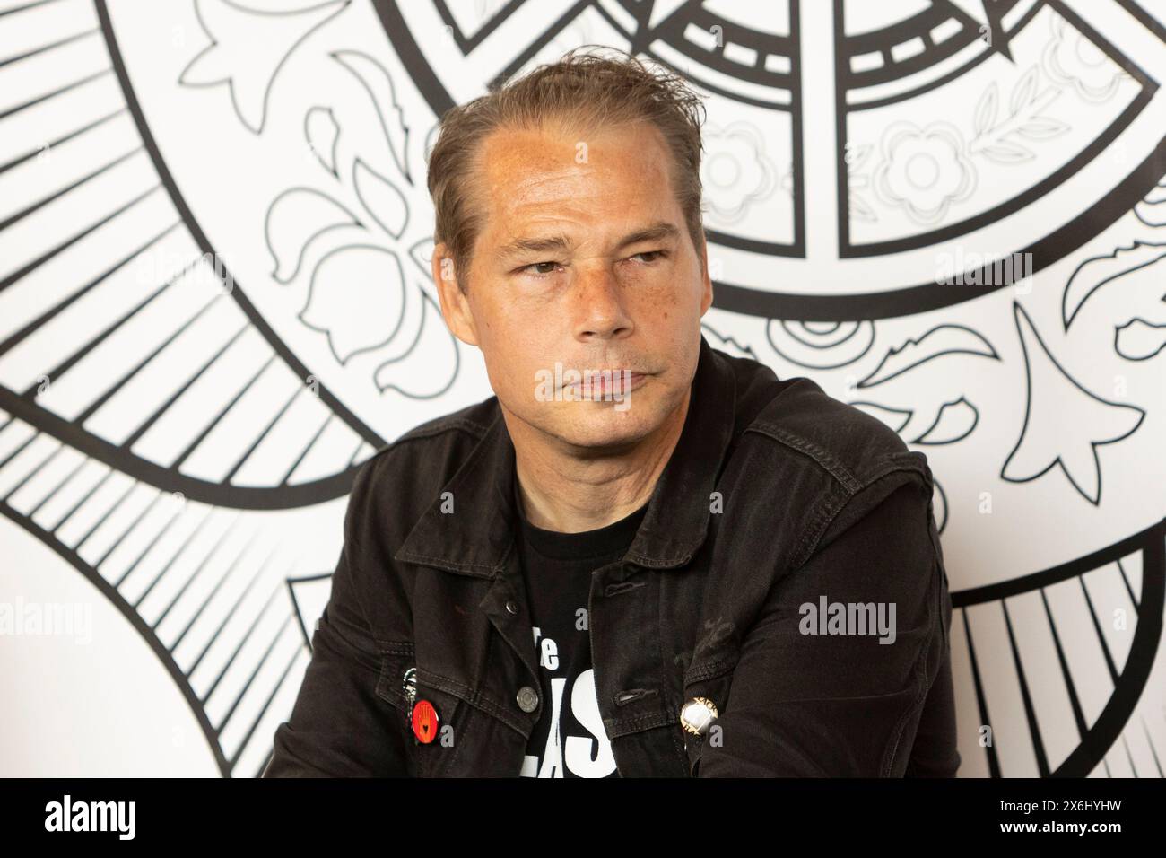 Shepard Fairey is seen during the opening of the exhibition Obey: The ...