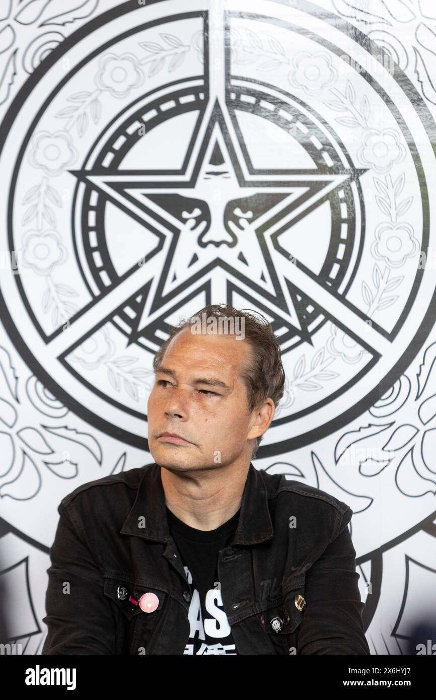 Shepard Fairey is seen during the opening of the exhibition Obey: The ...