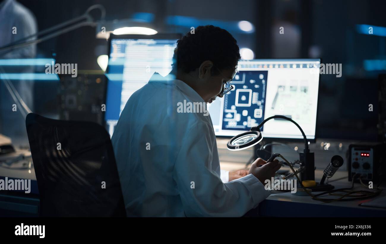 Modern Electronics Research, Development Facility: Black Female Engineer Does Computer ...