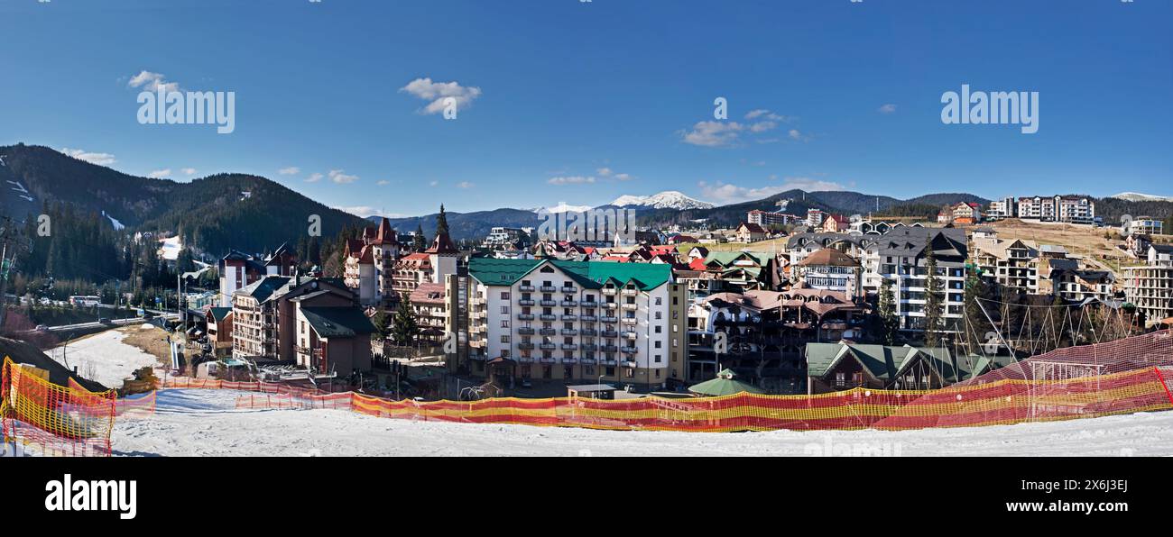 architectural ensemble near the ski slope at a ski resort on a sunny ...