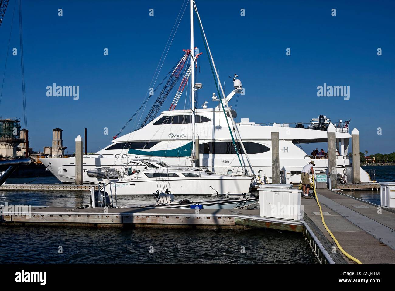 marina, small sailboat, large motoryacht, docked, capped pilings ...