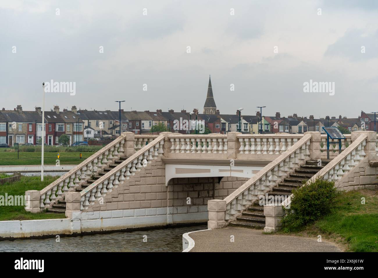 Redcar, North Yorkshire, UK. Bridge over Coatham Boating Lake in the ...
