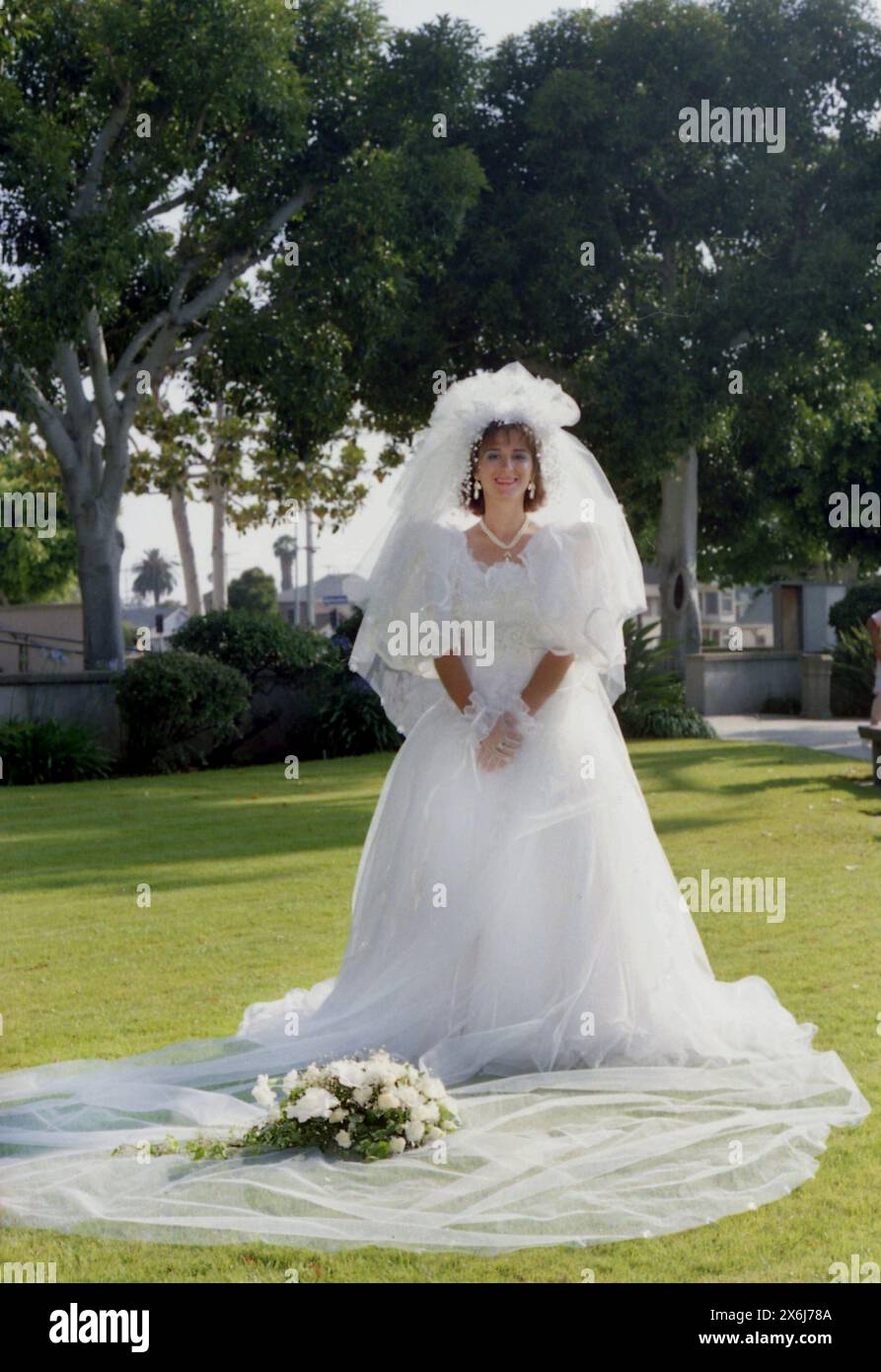 Los Angeles, CA, U.S.A., approx. 1985. A bride posing in her wedding ...