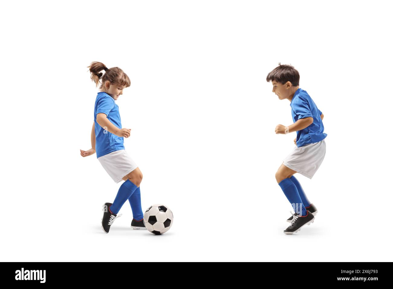 Boy and girl playing football isolated on white background Stock Photo ...