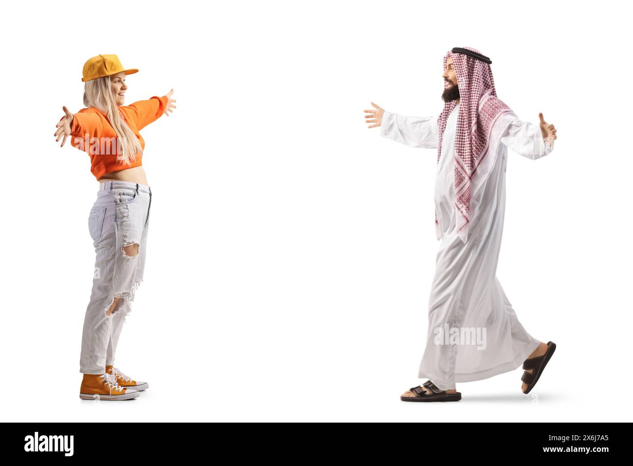 Full length profile shot of a young female meeting a muslim male friend ...