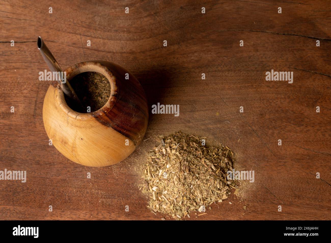 overview of a gourd Mate with yerba mate on a rustic wood table Stock ...