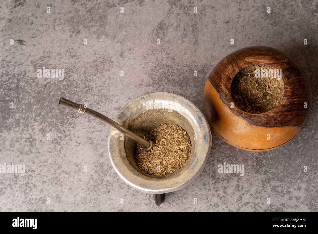 overview of a gourd Mate with yerba mate on a rustic wood table Stock ...