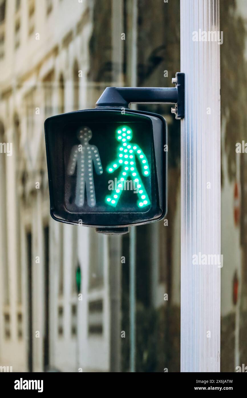 Green signal at a pedestrian traffic light Stock Photo - Alamy