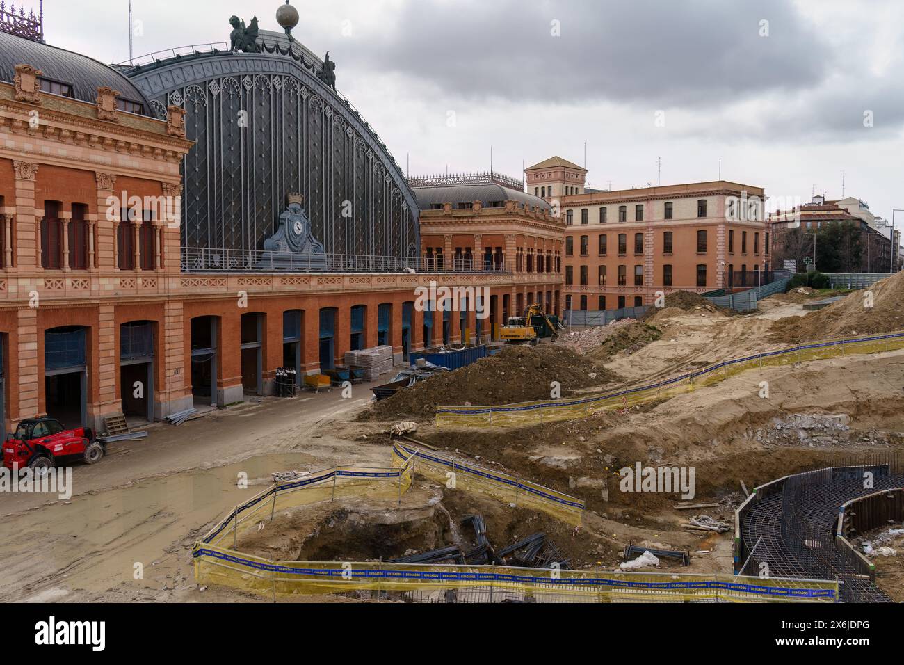 Madrid, Spain. February 11, 2024 - Construction yard outside the historic Atocha railway station ...