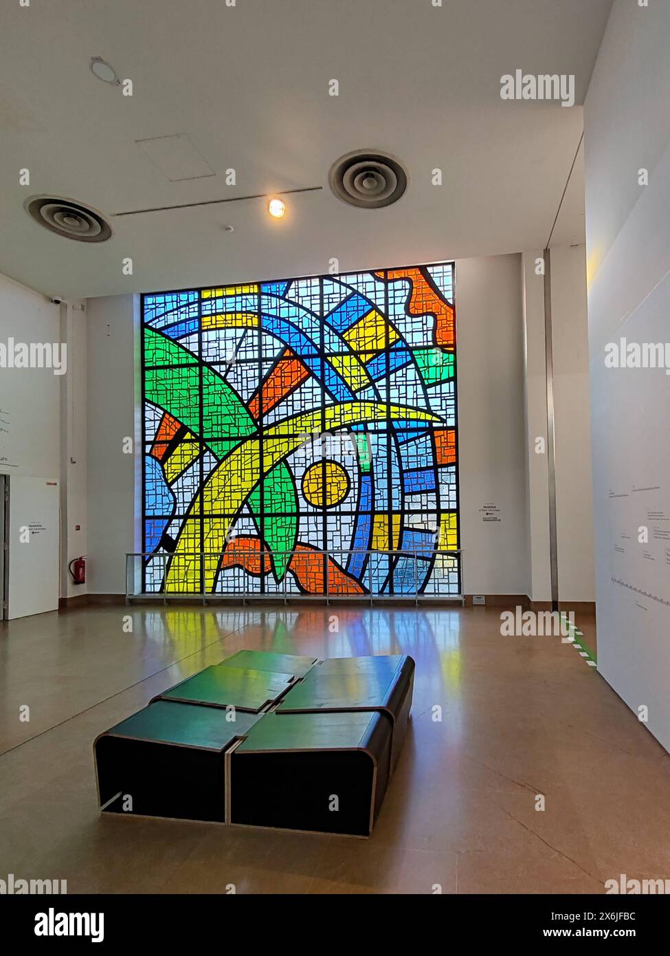 Biot, France - December 4, 2023: Big stained glass window inside the ...