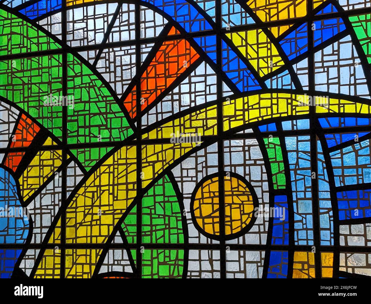 Biot, France - December 4, 2023: Big stained glass window inside the ...