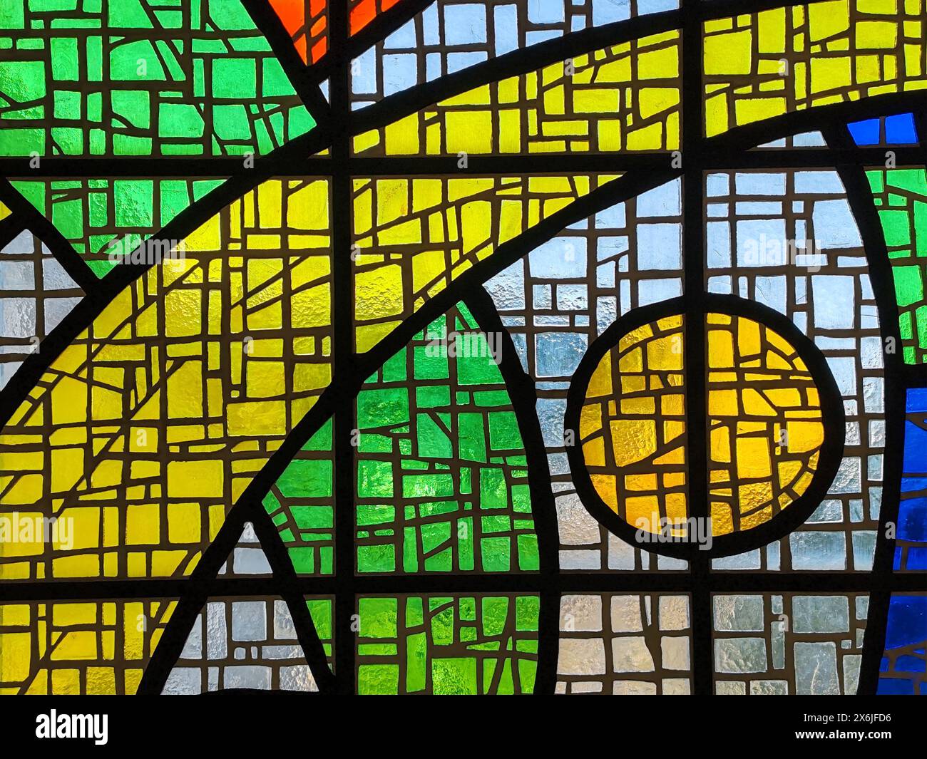 Biot, France - December 4, 2023: Big stained glass window inside the ...