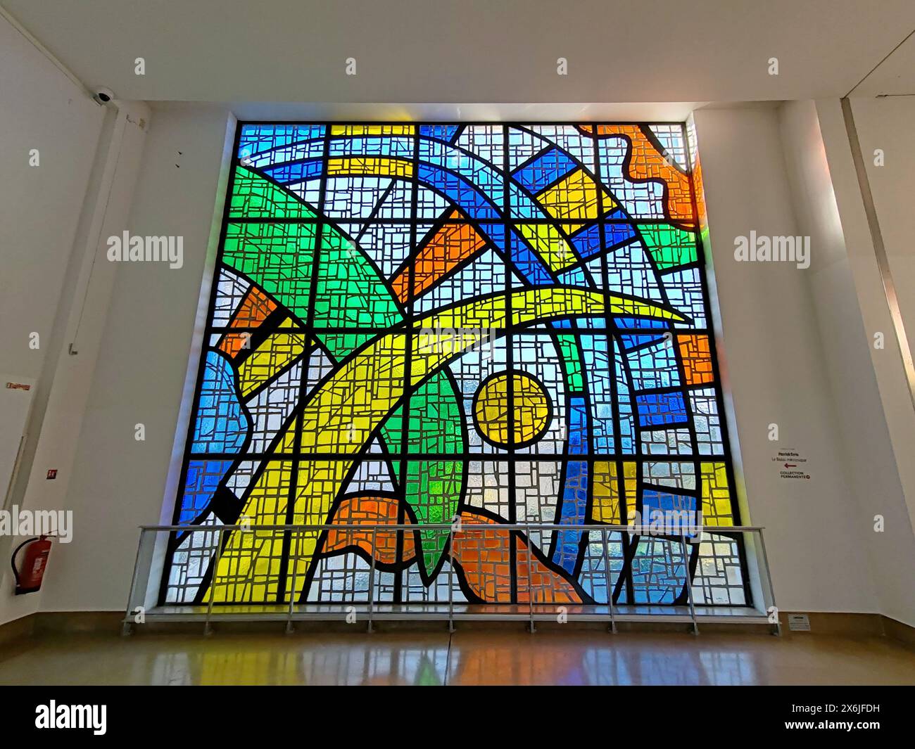 Biot, France - December 4, 2023: Big stained glass window inside the ...