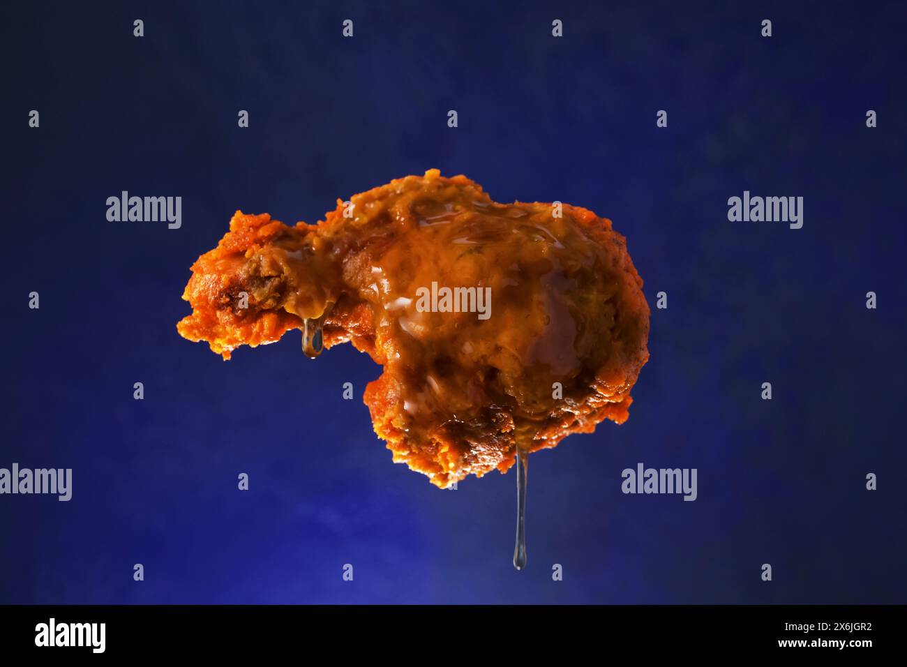 Buffalo chicken wing with honey Stock Photo - Alamy