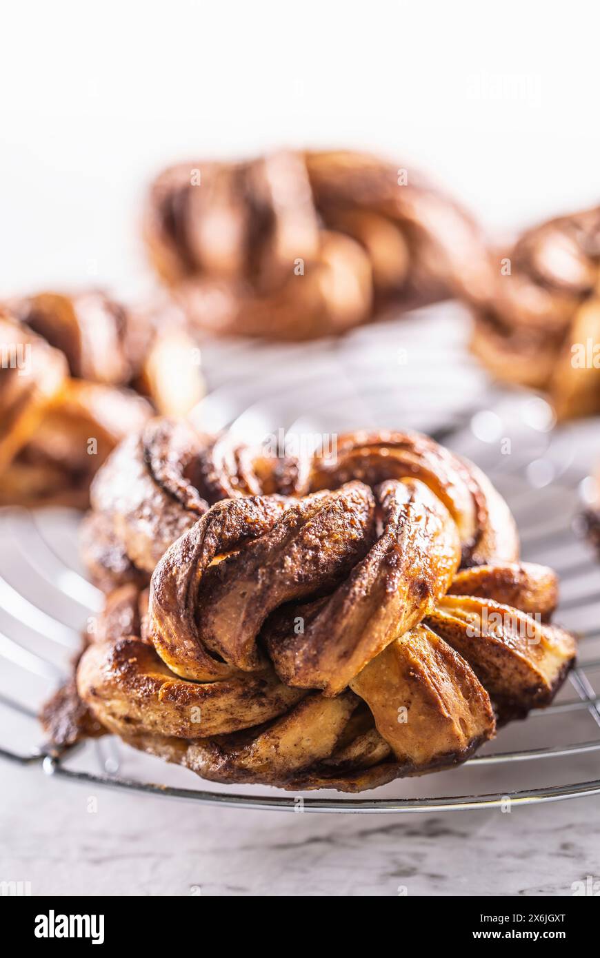 Caramel and cinnamon knots Stock Photo - Alamy