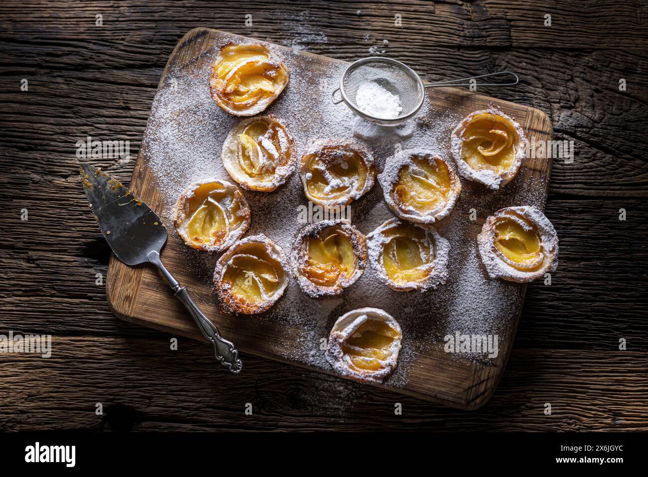 Mini puff pastry apple tartlets with icing sugar Stock Photo - Alamy