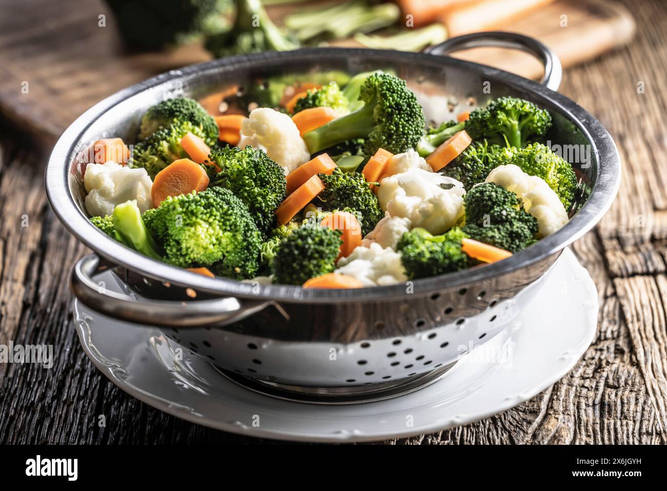 Broccoli, carrots and cauliflower in stainless steel steamer Stock ...