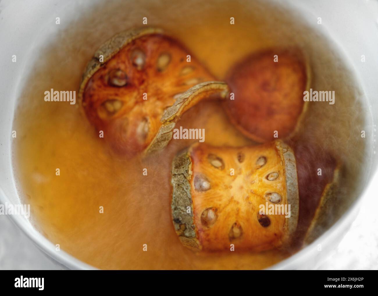 Bael fruit tea Stock Photo - Alamy