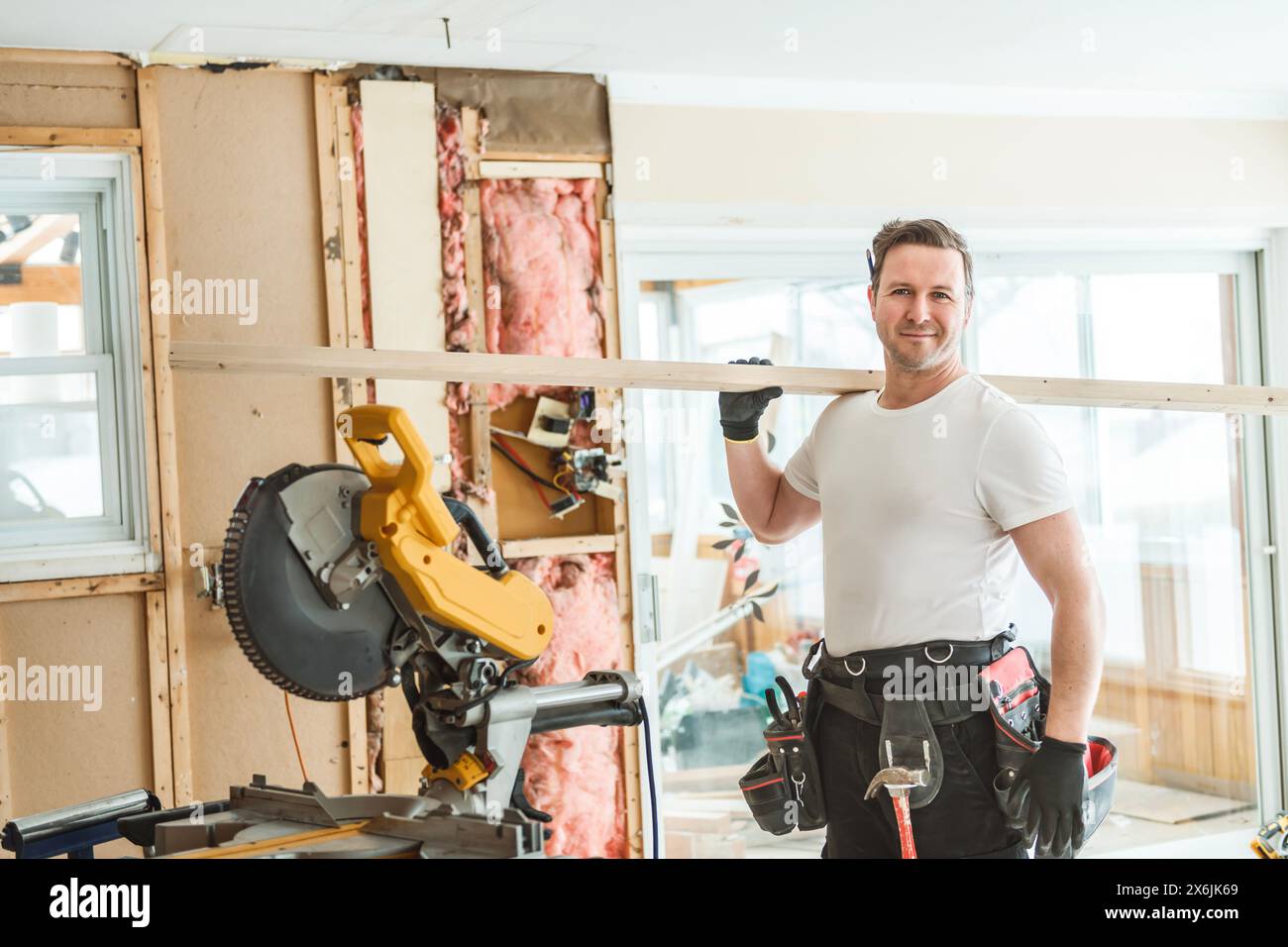 Carpenter men working in an old house Stock Photo - Alamy