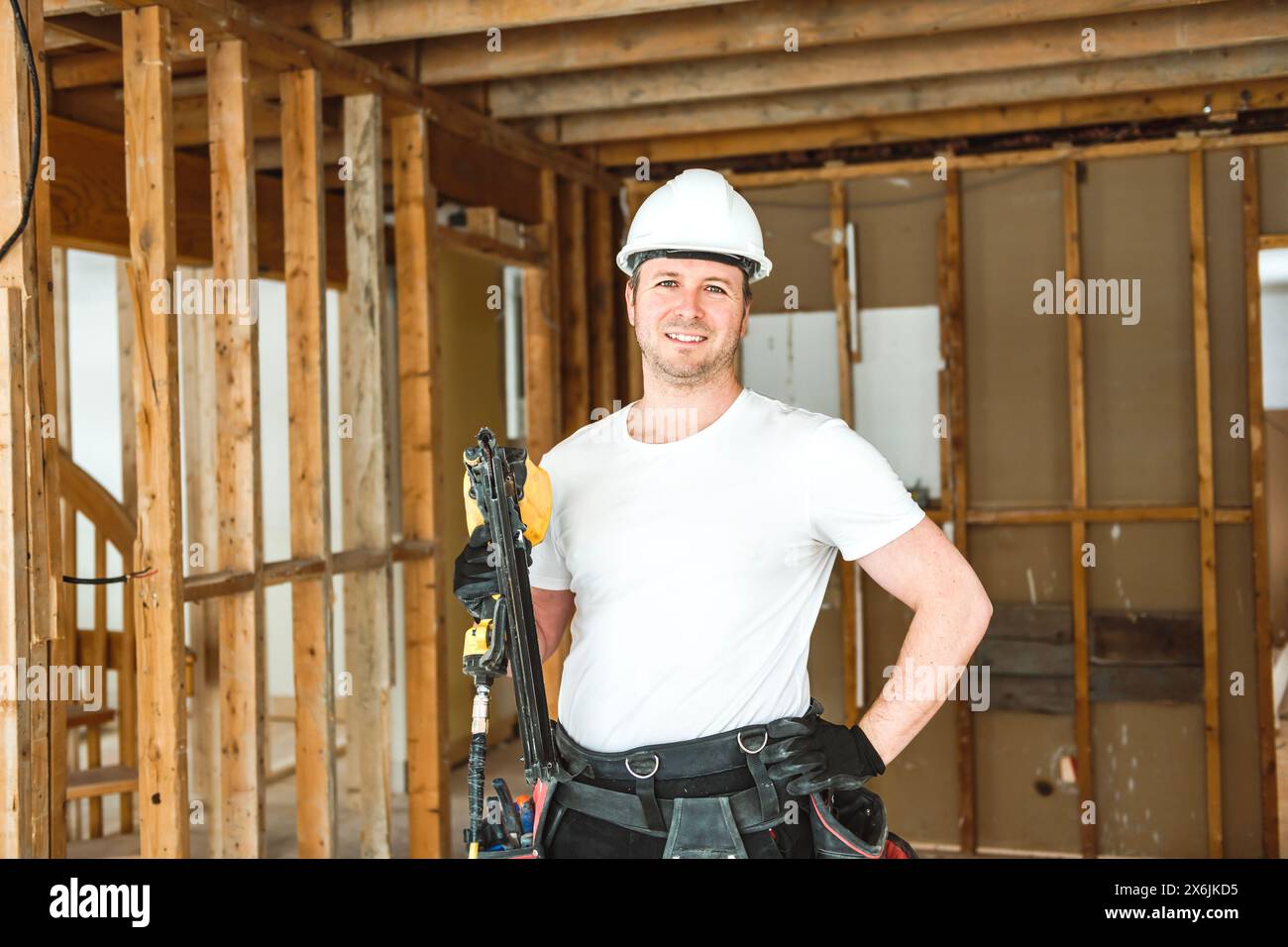 Carpenter men working in an old house Stock Photo - Alamy