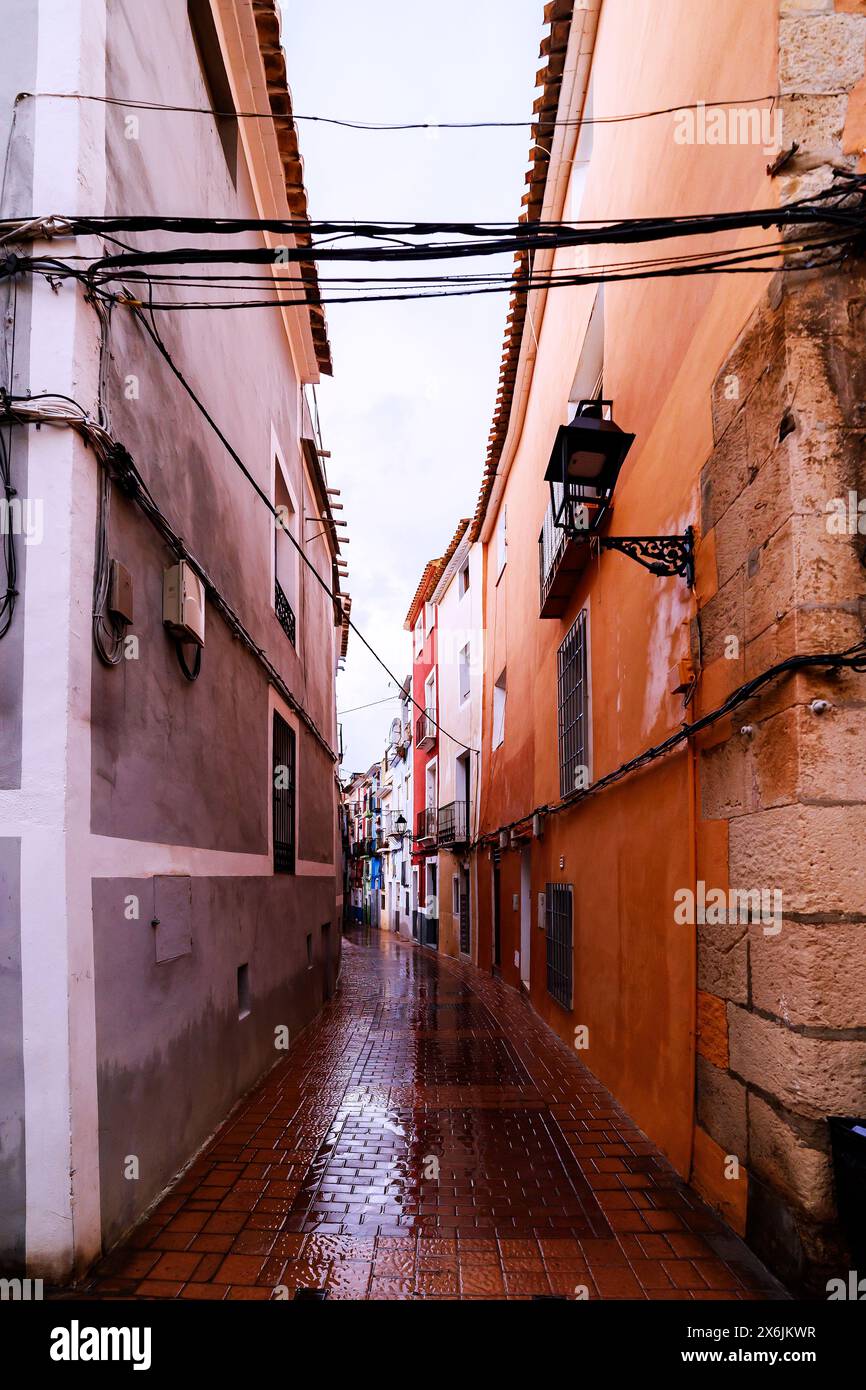 Maria Amada Street in the rain in Villajoyosa Stock Photo - Alamy