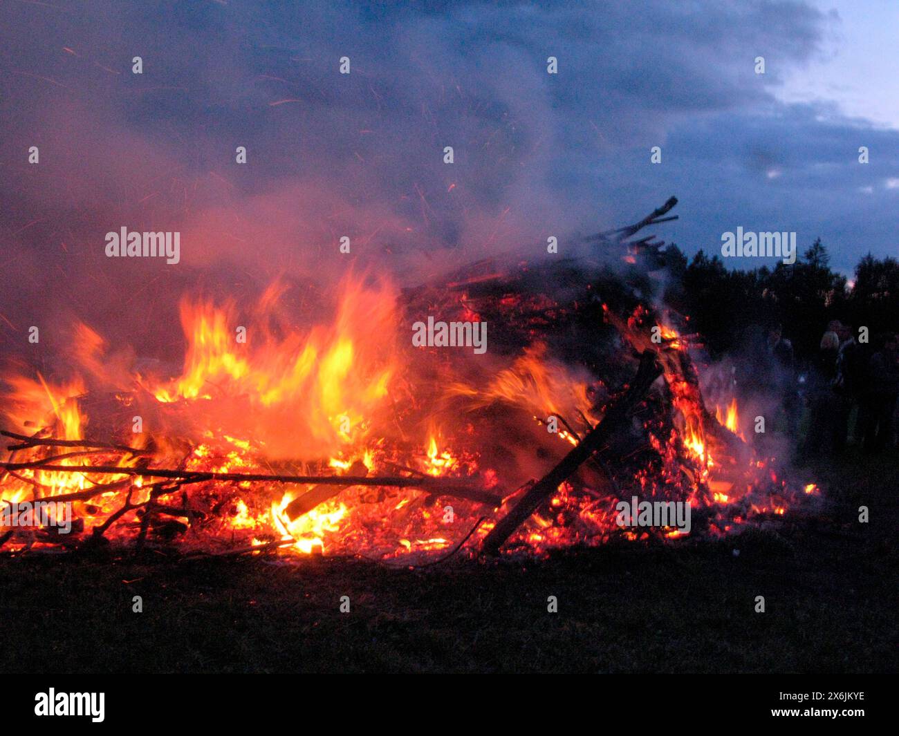 the flames of a burning fire as a heat source the flames of a fire ...