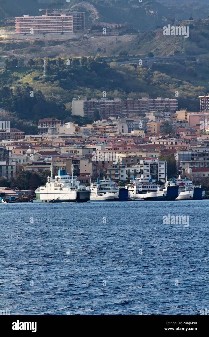 Italy, Sicily, view of Messina town and some ferryboats that connect ...