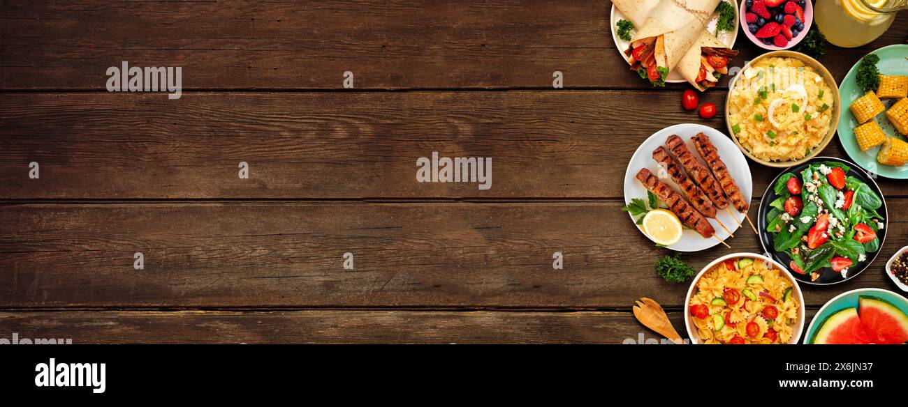 Summer food side border over a dark wood banner background. Assorted ...