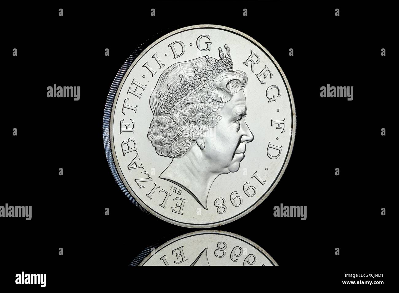 The first UK £5 coin to feature the 4th coin portrait of Queen Elizabeth II. Designed by Ian ...