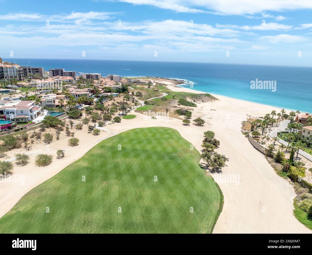 Aerial view of luxury golf course on the pacific ocean in Los Cabos ...