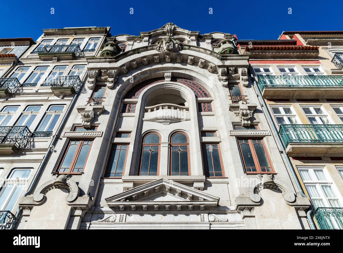 Facade of old classic buildings in the old town of Porto or Oporto ...
